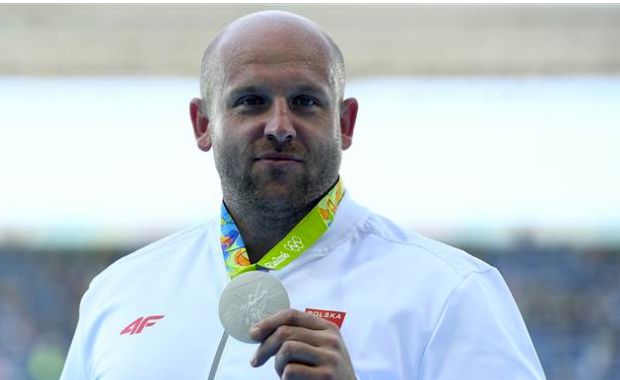 Polish Track Star Auctions Off Olympic Medal to Help Child With Cancer ...